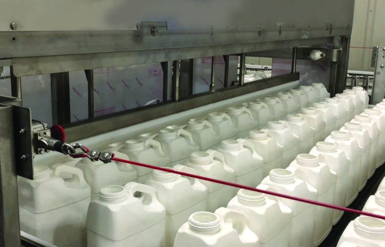 Multi-Conveyor accumulates non-rounds using Pneumatic Sweeper Arm ...